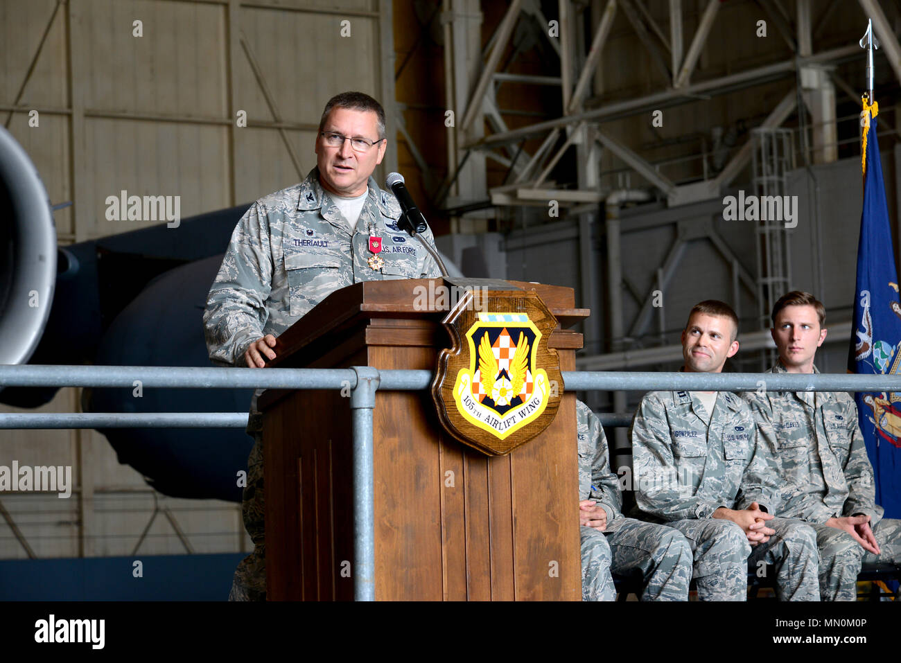 Col. Bruce Theriault, outgoing commander of the 105th Maintenance Group ...