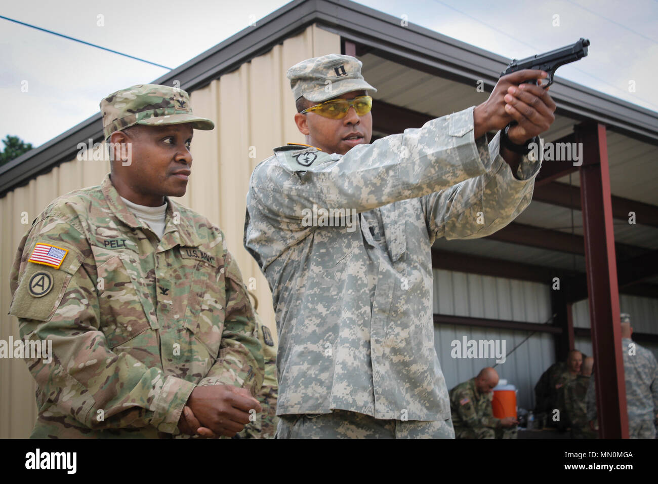 Army Reserve Soldier Capt. Devron M. Gardner (right), officer-in-charge ...