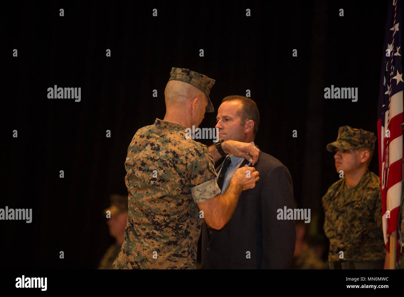 Retired U.S. Marine Corps Maj. Michael S. Seely is awarded with a ...
