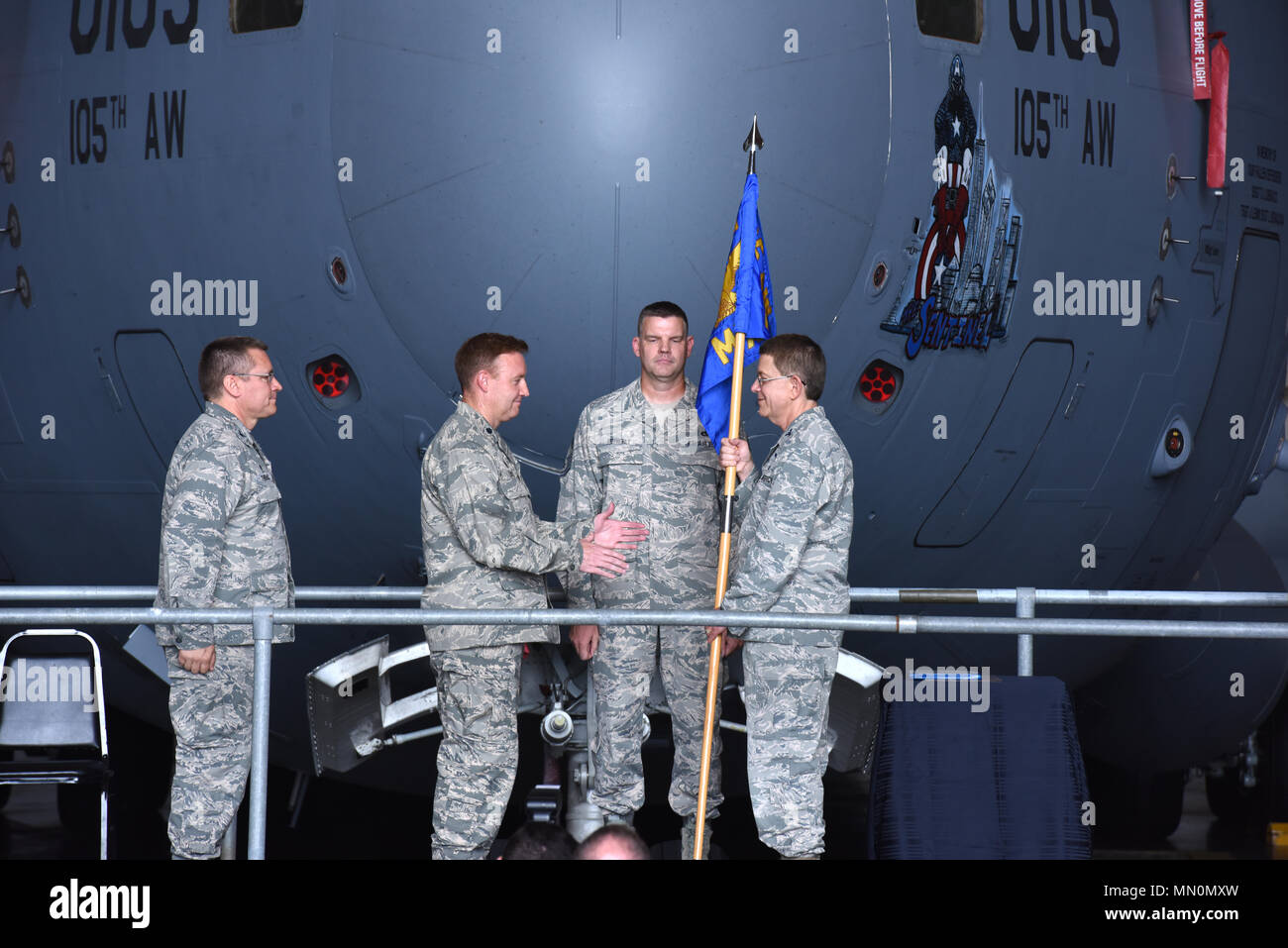 Lt. Col. Richard Carter receives the 105th Maintenance Group guidon ...