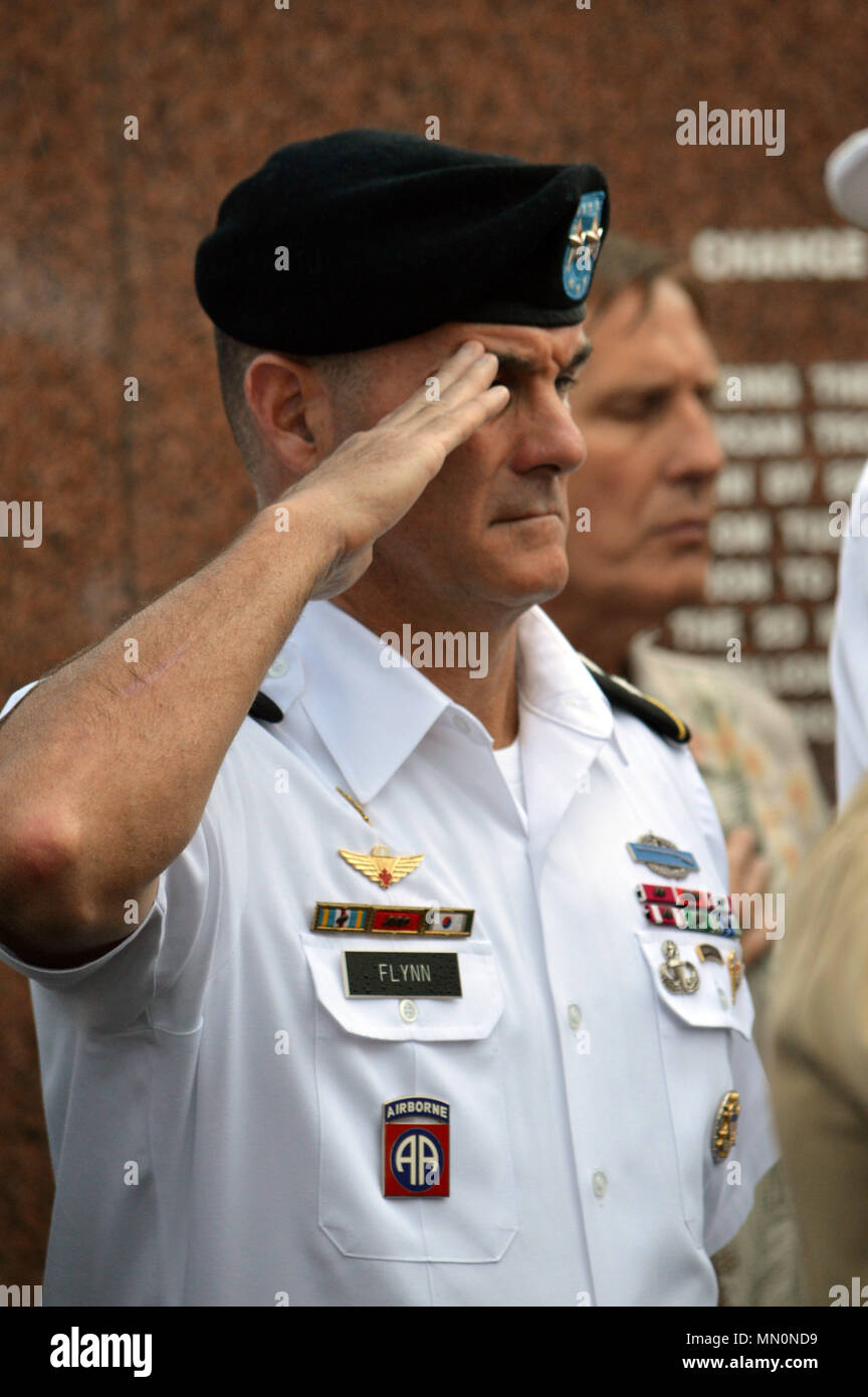 Maj. Gen. Charles A. Flynn salutes during the 75th Anniversary of the ...