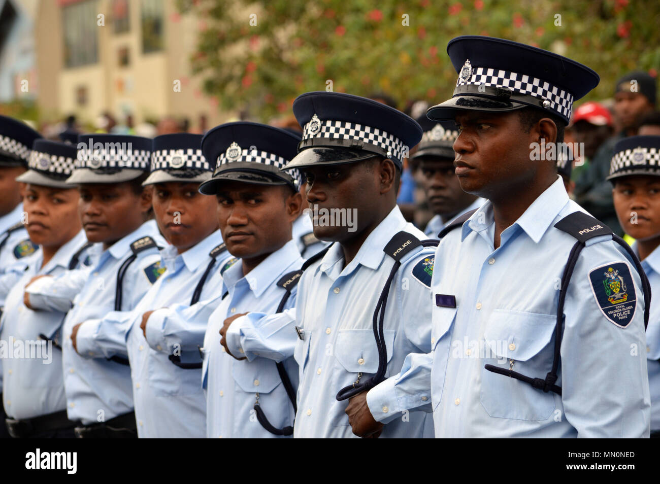 Members the Royal Solomon Islands Police Force dress right prior to the ...