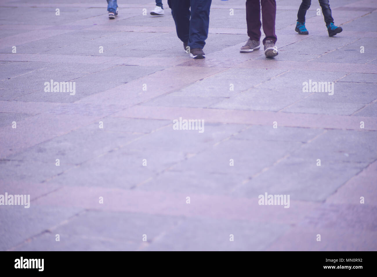 People walking in busy urban city shopping street sidewalk pavement ...