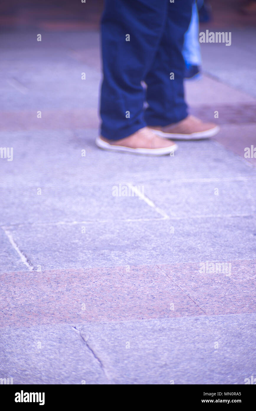 People walking in busy urban city shopping street sidewalk pavement ...