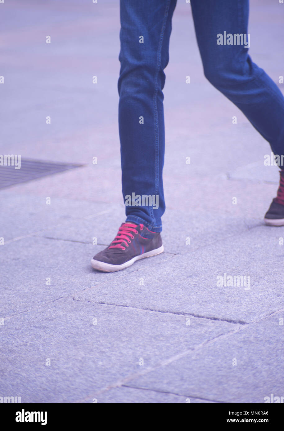 People walking in busy urban city shopping street sidewalk pavement ...