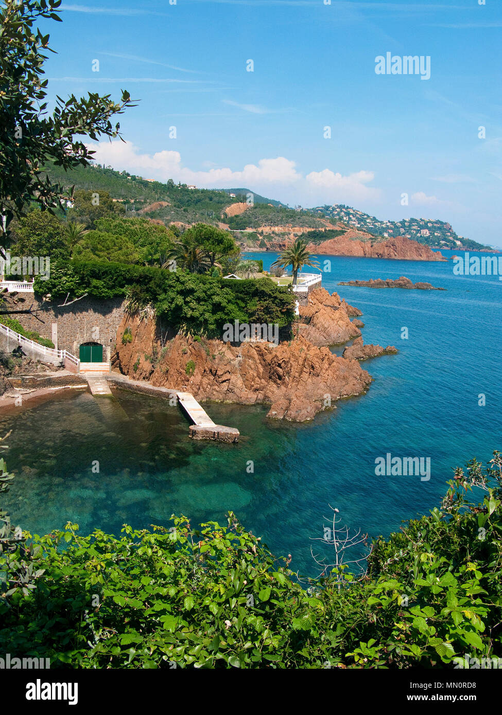 Small bathing bay at the rocky coast of Le Trayas, Esterel region ...