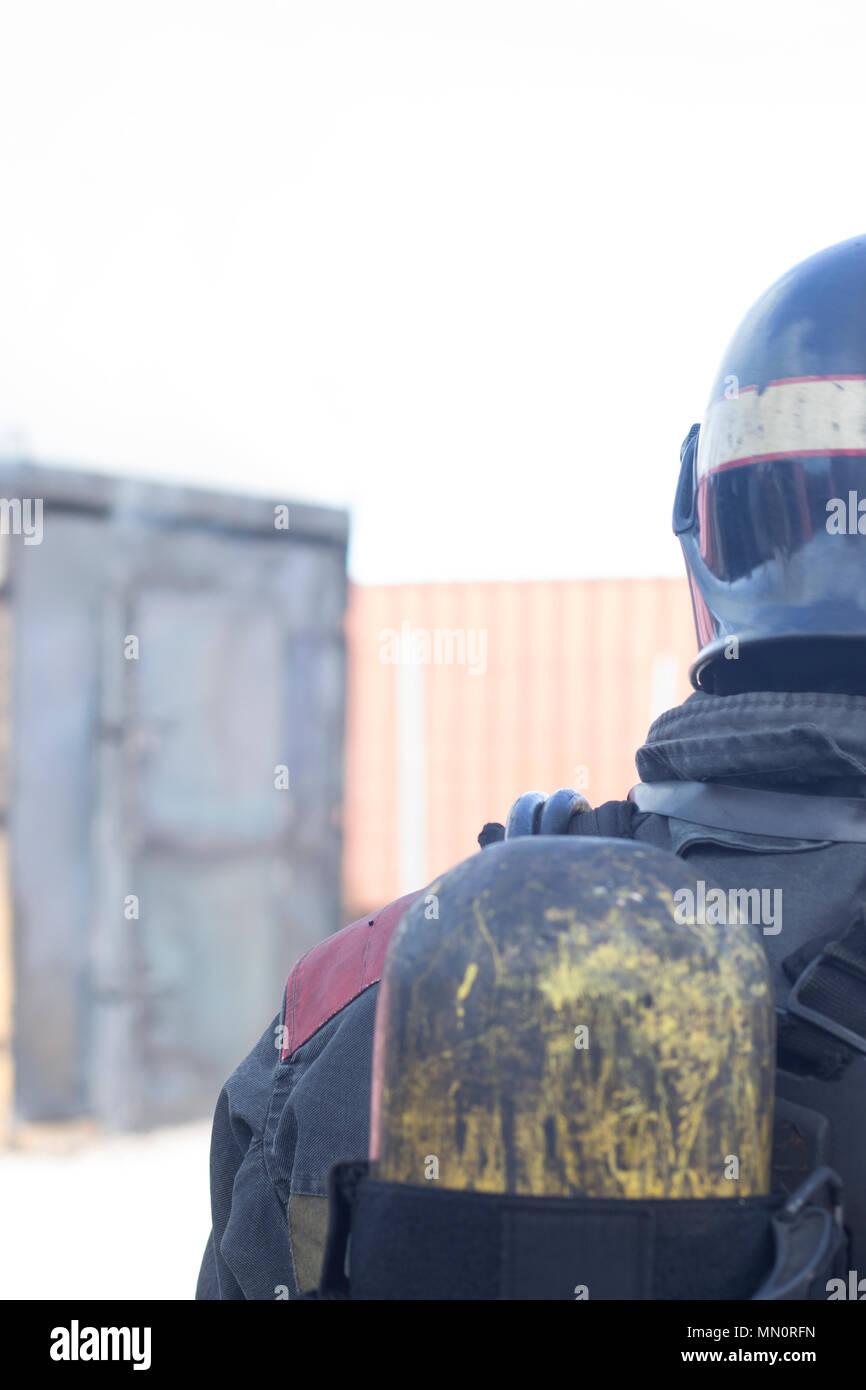 Firefighter putting out fire training station extinguisher backdraft ...