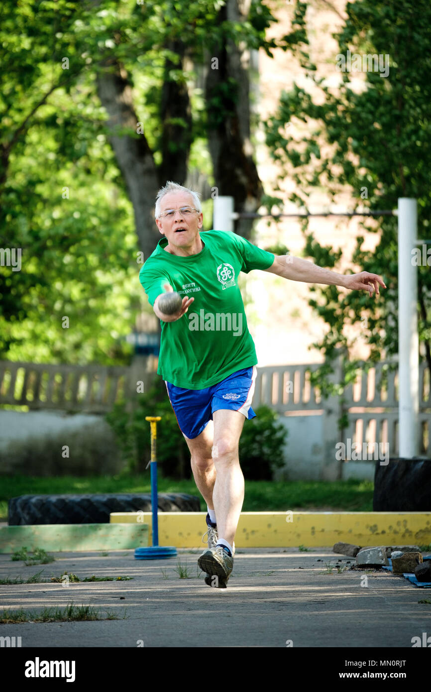 Russian athlete Mikhail Popov throws a metal ball for bocce volo Stock ...
