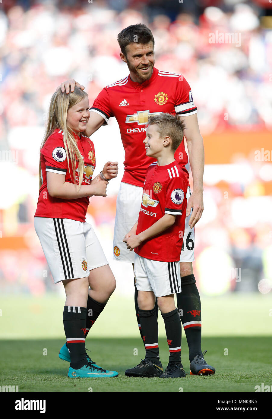 Michael Carrick with to his children Louise and Jacey after the game ...