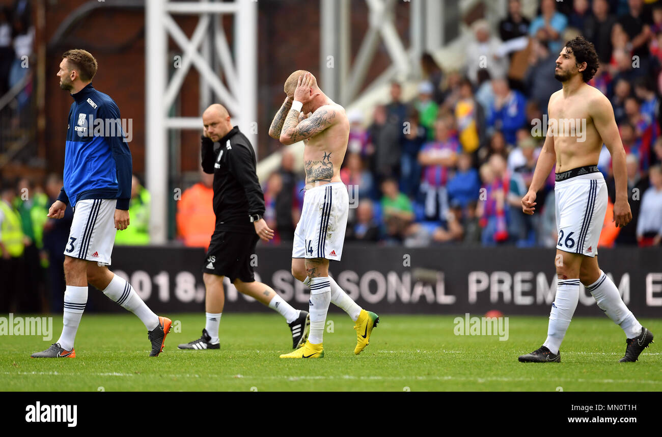 West Bromwich Albion's James McClean (centre) looks dejected after the ...