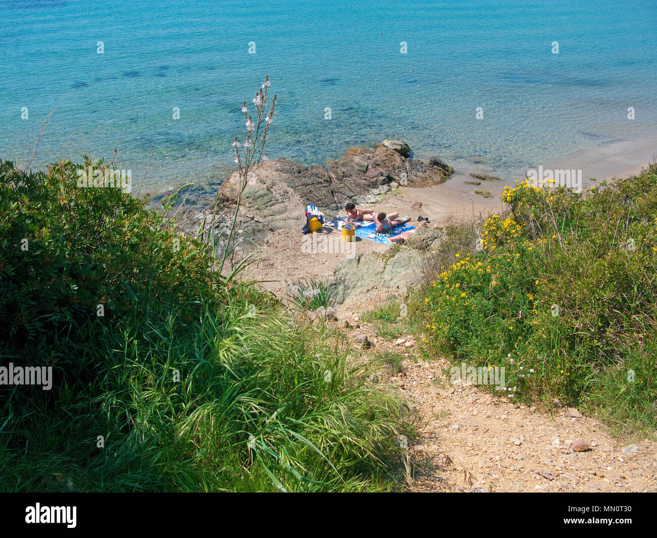 Couple at a small rocky beach at Agay, neighbourhood of Saint-Raphael ...