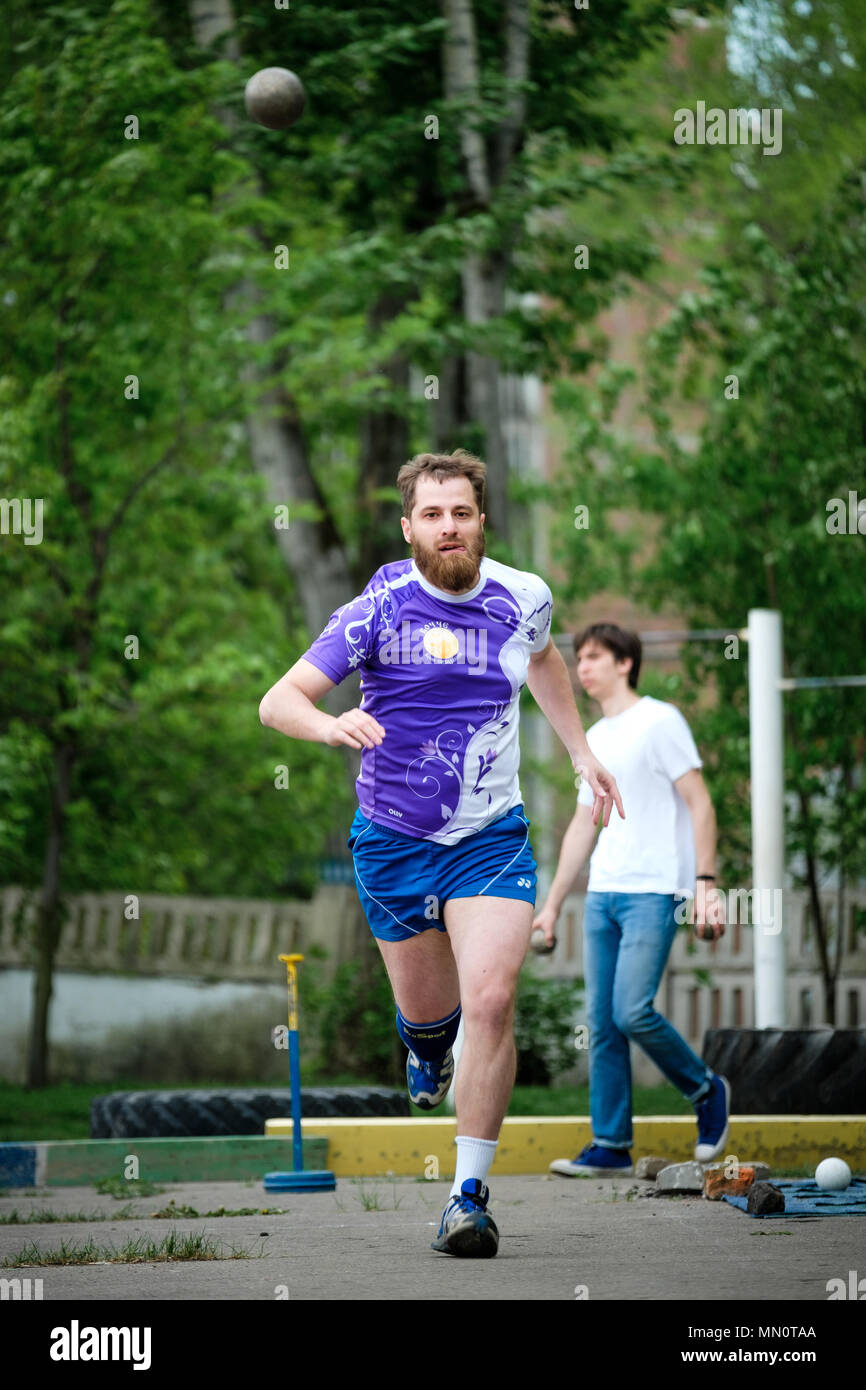 Russian athlete Evgeny Eremeev throws a metal ball for bocce volo Stock ...