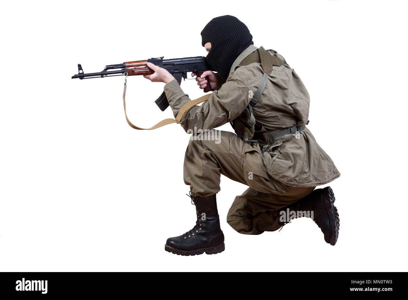 Robber with kalashnikov isolated Stock Photo - Alamy