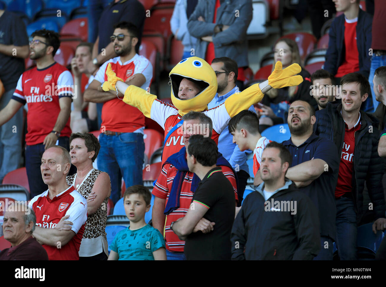 Arsenal fans celebrate in the stands after the Premier League match at ...