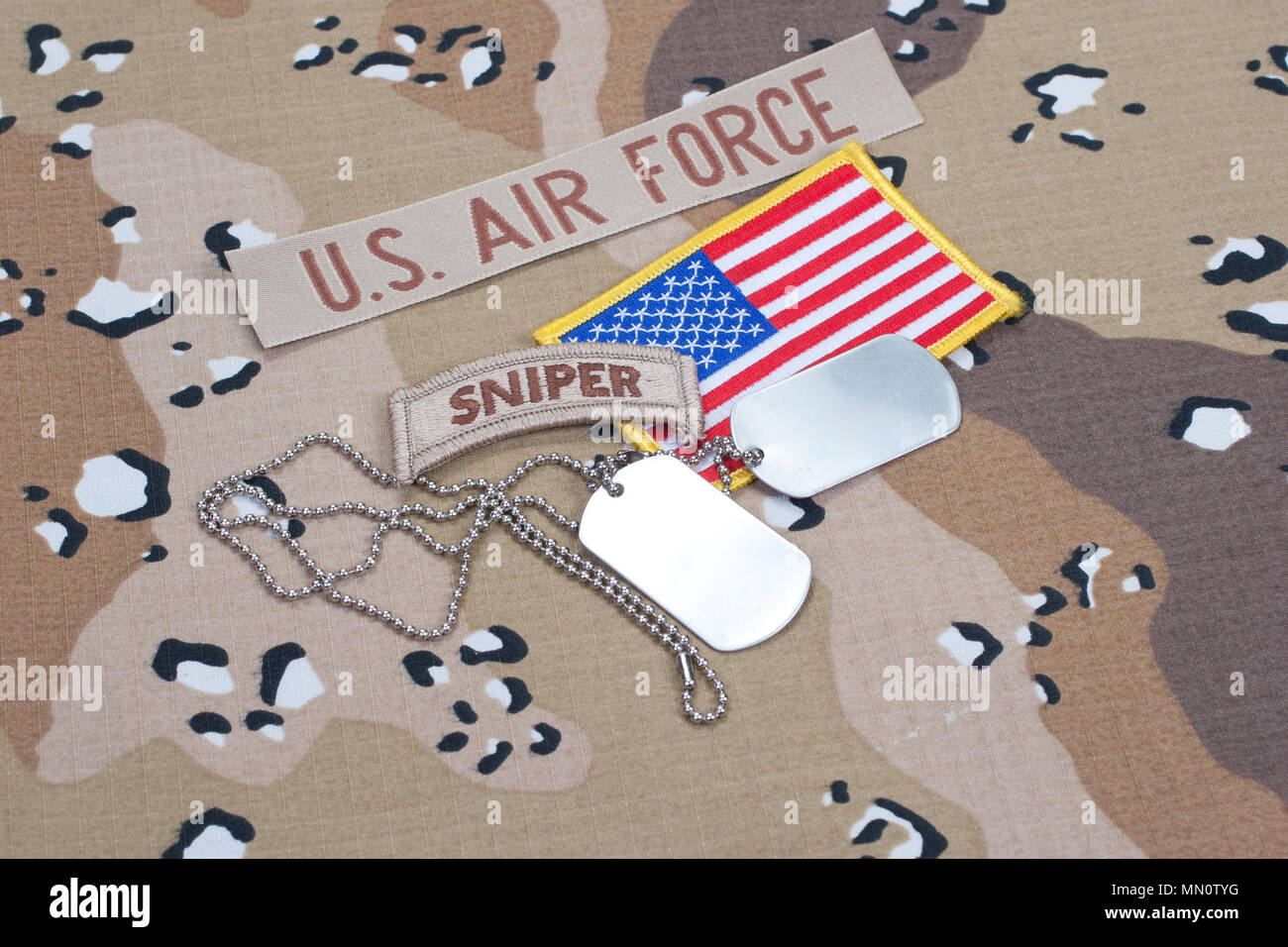 US ARMY sniper tab with blank dog tags on camouflage uniform Stock ...