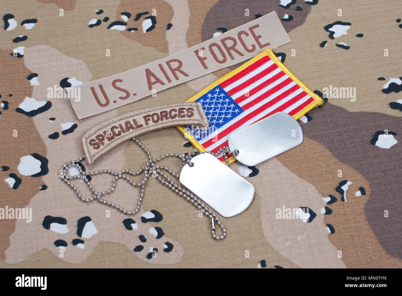 US ARMY ranger tab with blank dog tags on camouflage uniform Stock ...