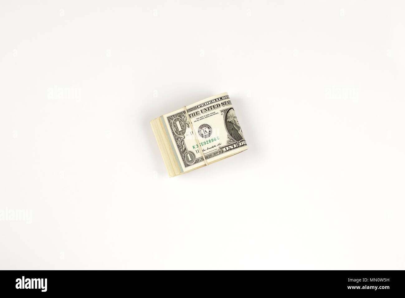 Stack of USA 1 dollars isolated on white background Stock Photo - Alamy