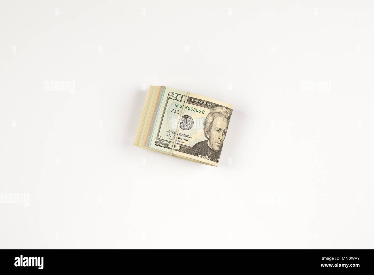 Stack of USA 20 dollars isolated on white background Stock Photo - Alamy