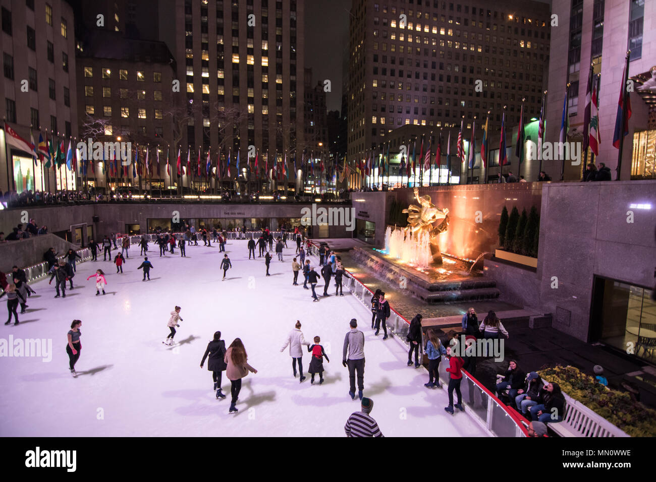New York, US - March 30, 2018: People at the Rockfeller center ice rink ...