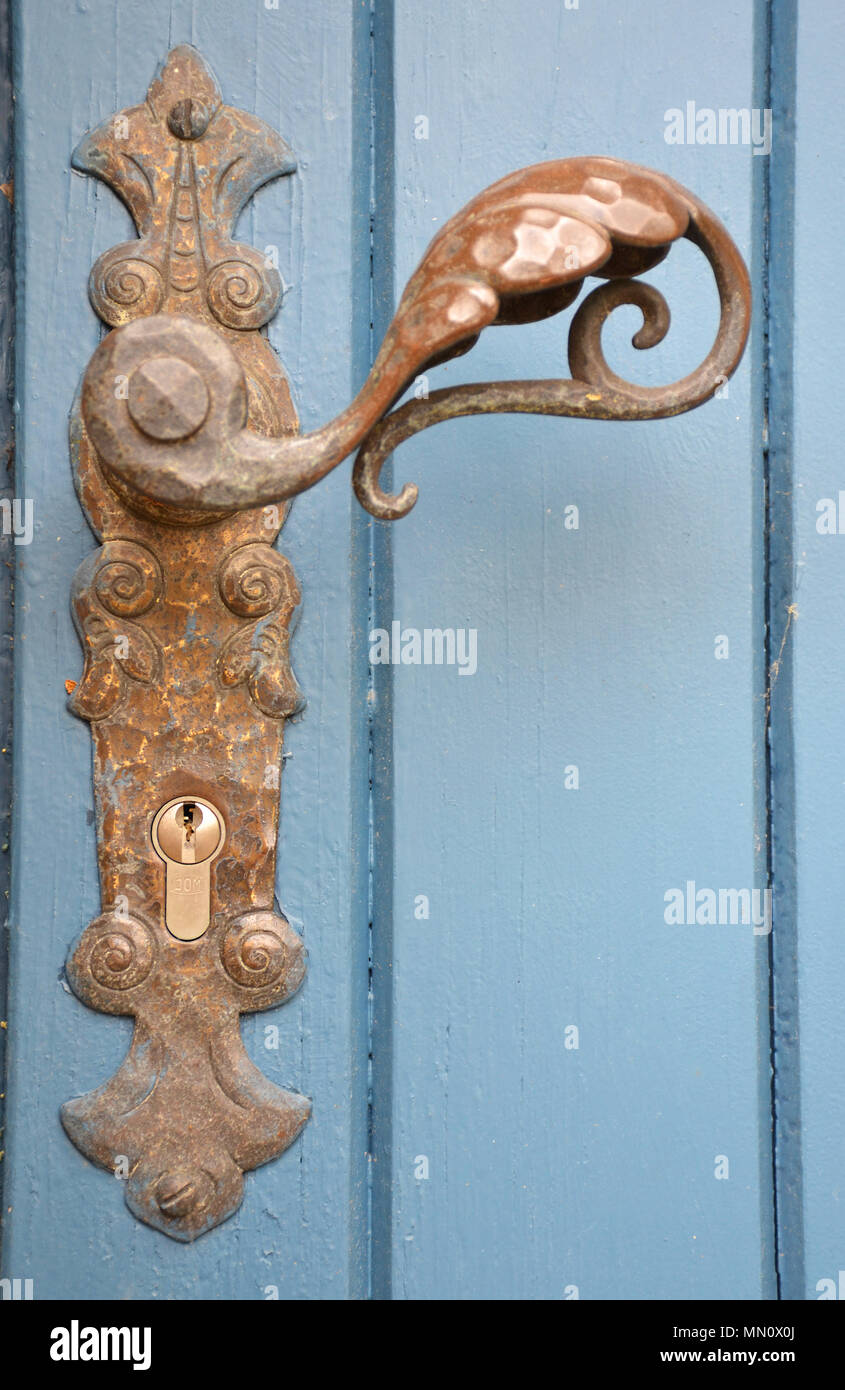 Old metal door handle Stock Photo - Alamy