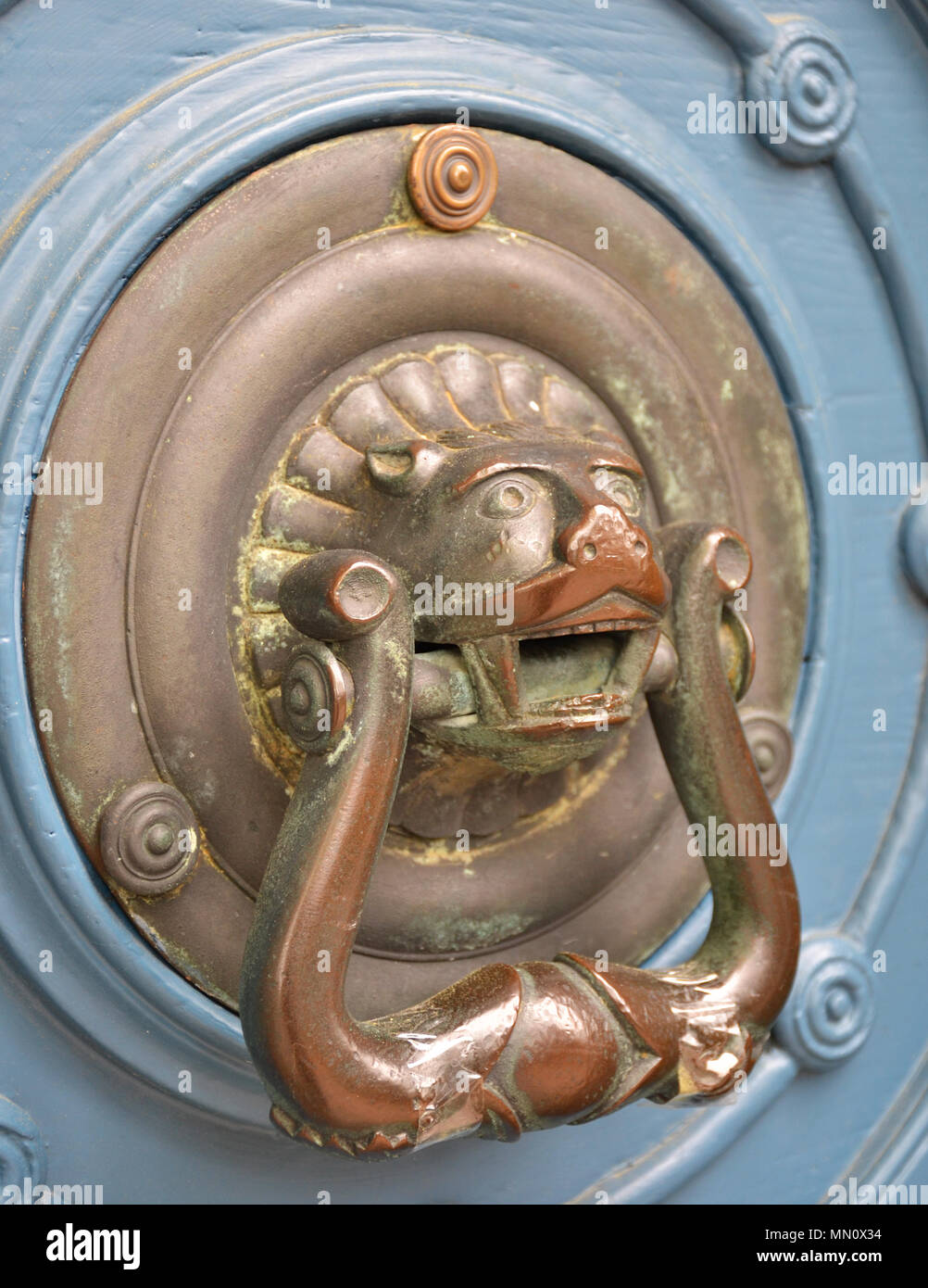 Old metal door handle Stock Photo - Alamy