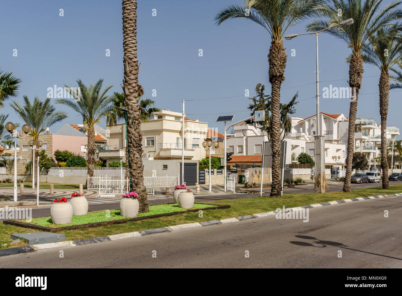 NAHARIYA, ISRAEL-MARCH 21, 2018: City streets with buildings in ...