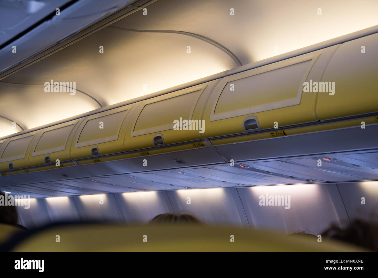 Luggage compartment, interior of an aeroplane Stock Photo - Alamy