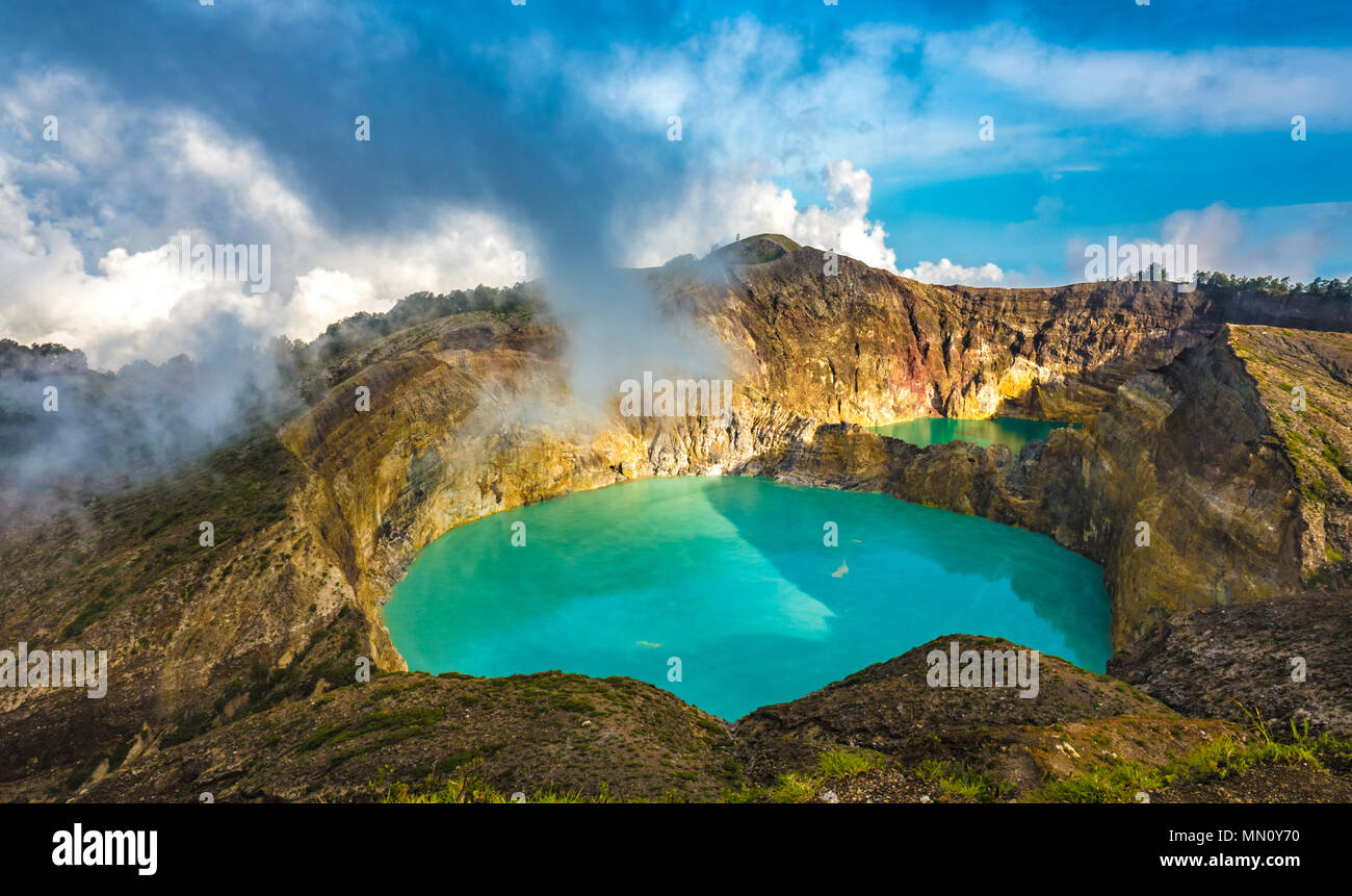 Kelimutu, multicolored cratered acid lakes that periodically change ...