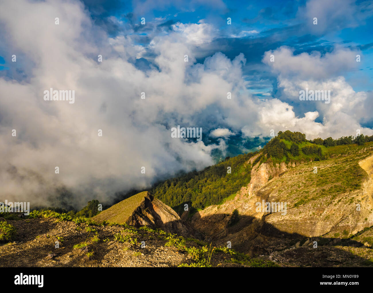 Kelimutu, multicolored cratered acid lakes that periodically change ...