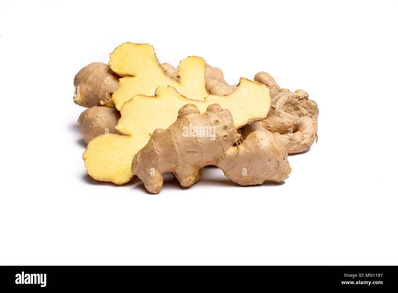 Fresh big ginger root close up copy space isolated on white background ...