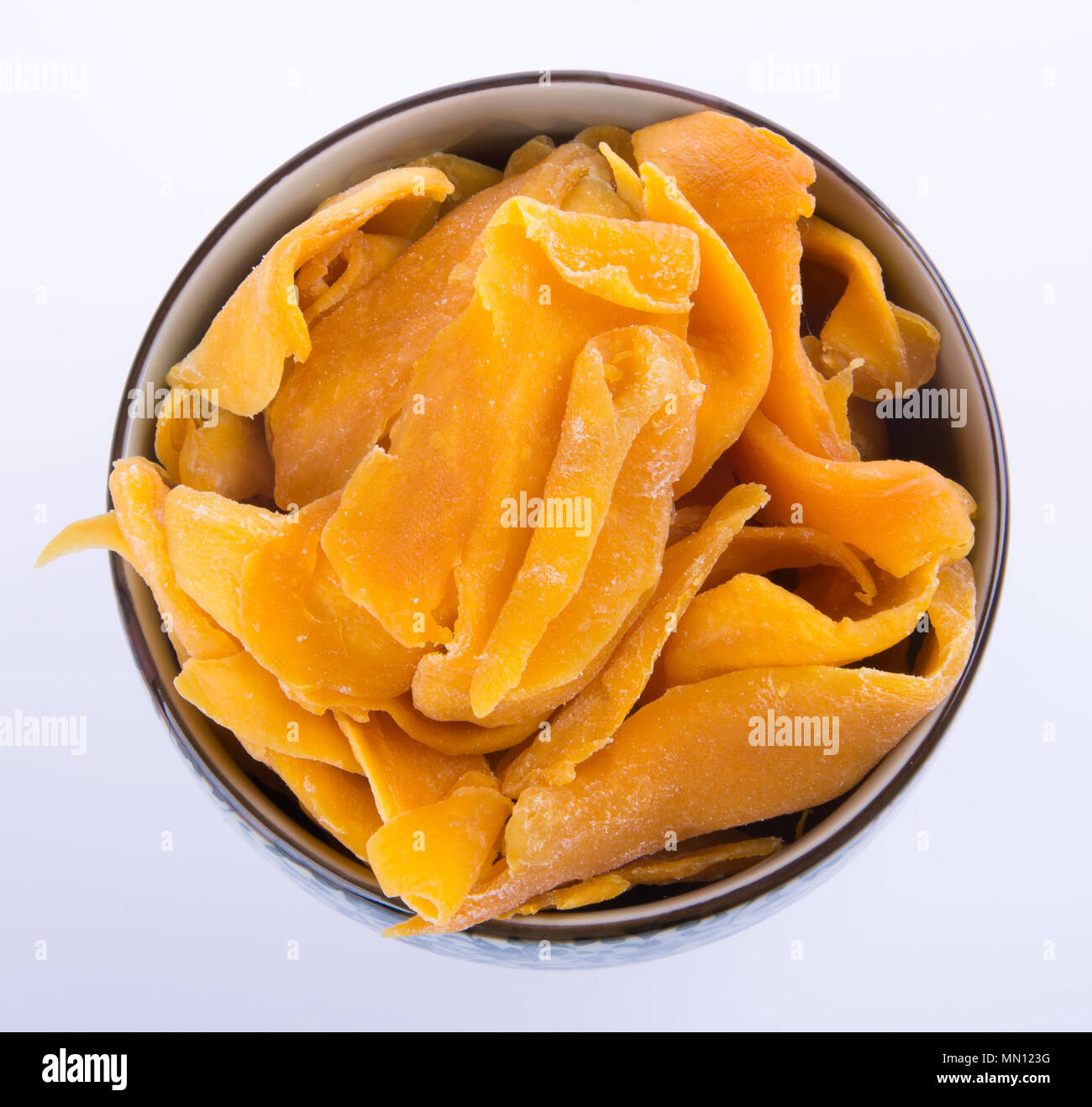mango dry in bowl or dried mango slices Stock Photo - Alamy
