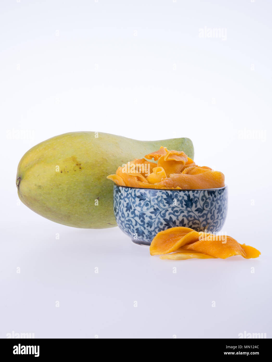 mango dry in bowl or dried mango slices Stock Photo - Alamy