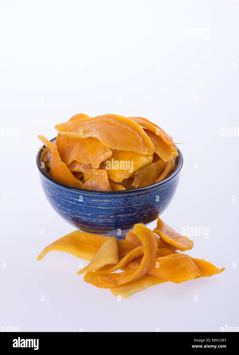 mango dry in bowl or dried mango slices Stock Photo - Alamy