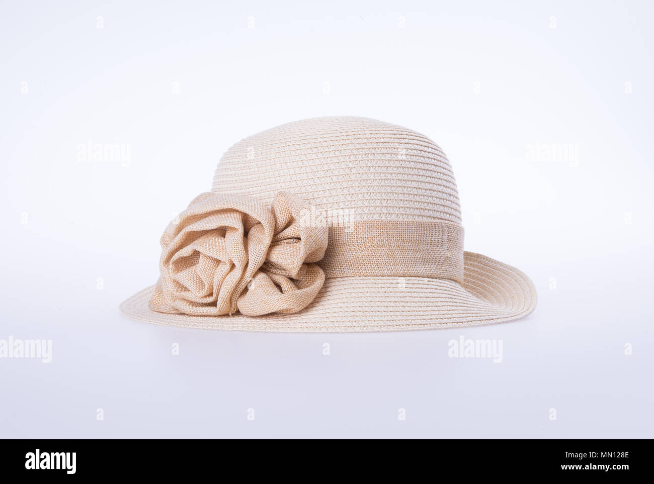 hat for lady or pretty straw hat with flower Stock Photo - Alamy
