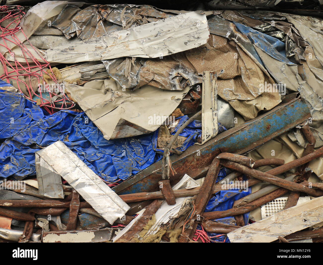 Compacted scrap metal for recycling Stock Photo - Alamy