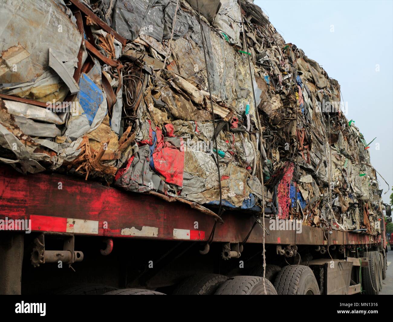 Compacted scrap metal for recycling on truck Stock Photo - Alamy