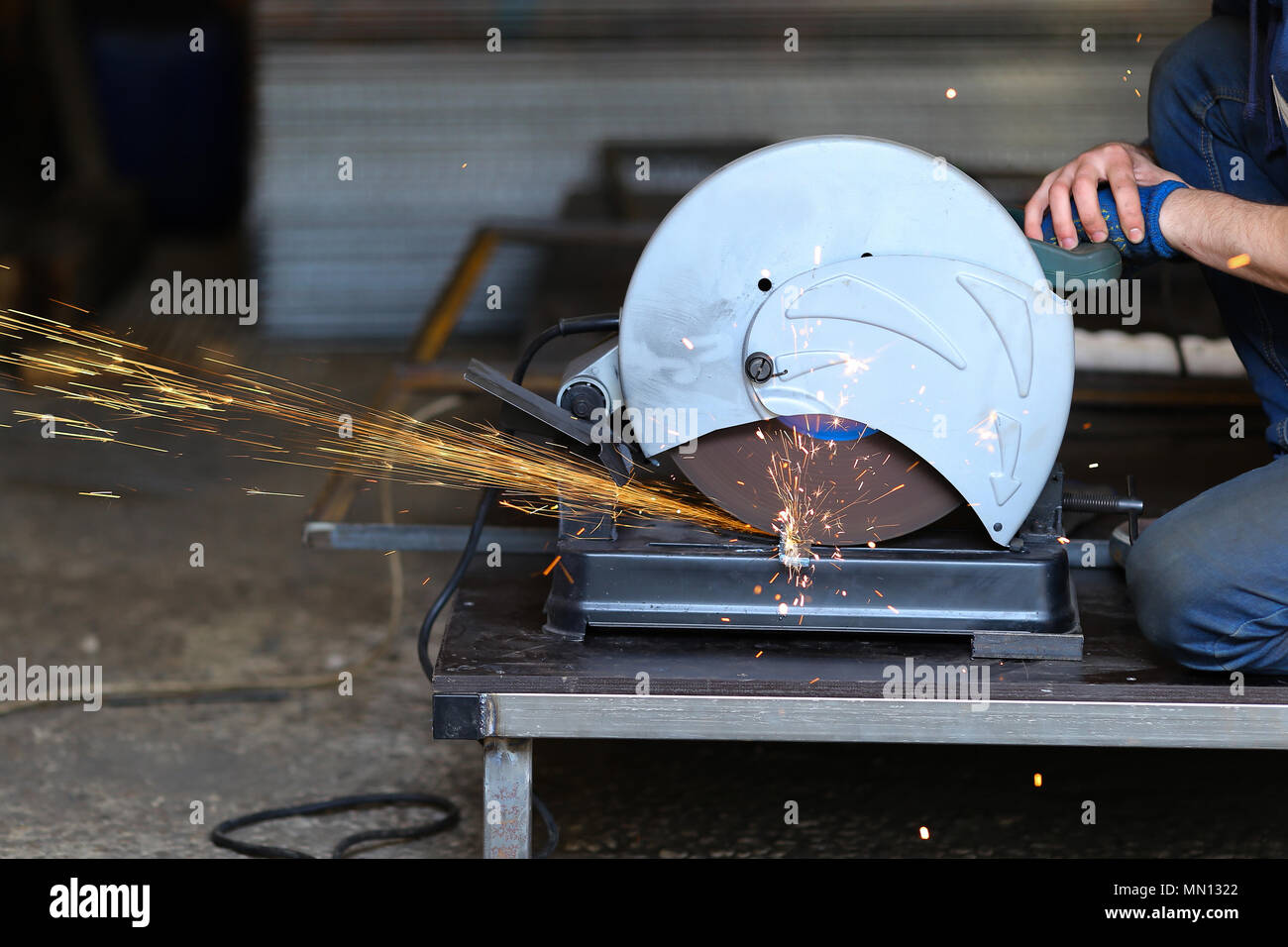 Caucasian male person saving metall constructions with sparks Stock ...