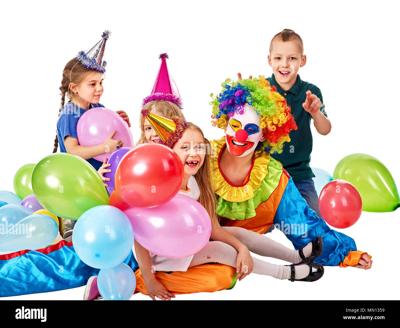 Birthday child clown playing with children. Kid holiday cakes ...