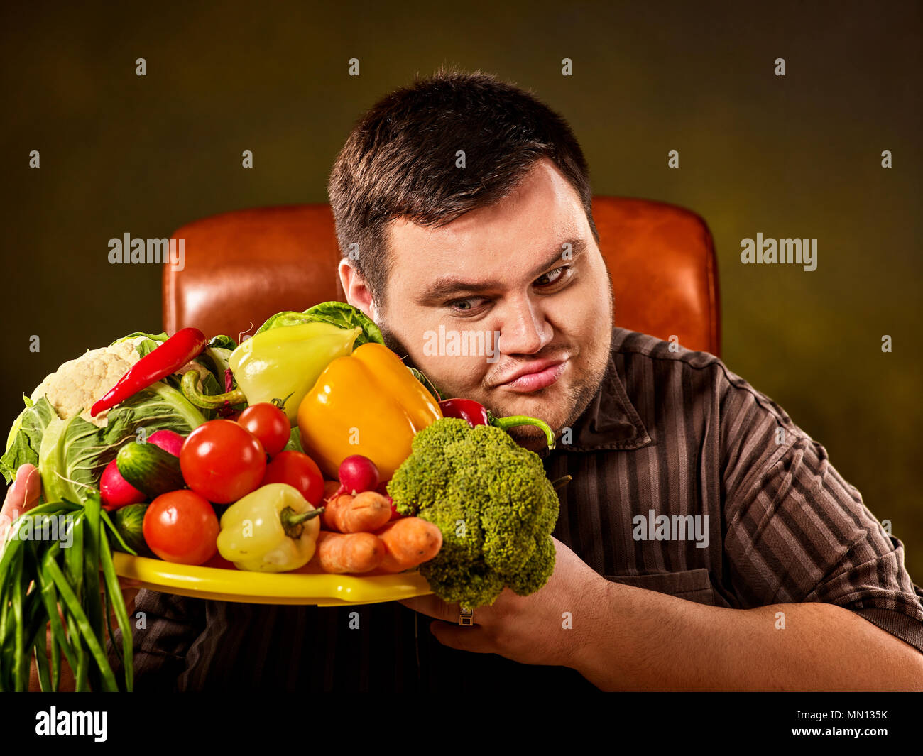 Diet fat man eating healthy food. Healthy breakfast with vegetables ...