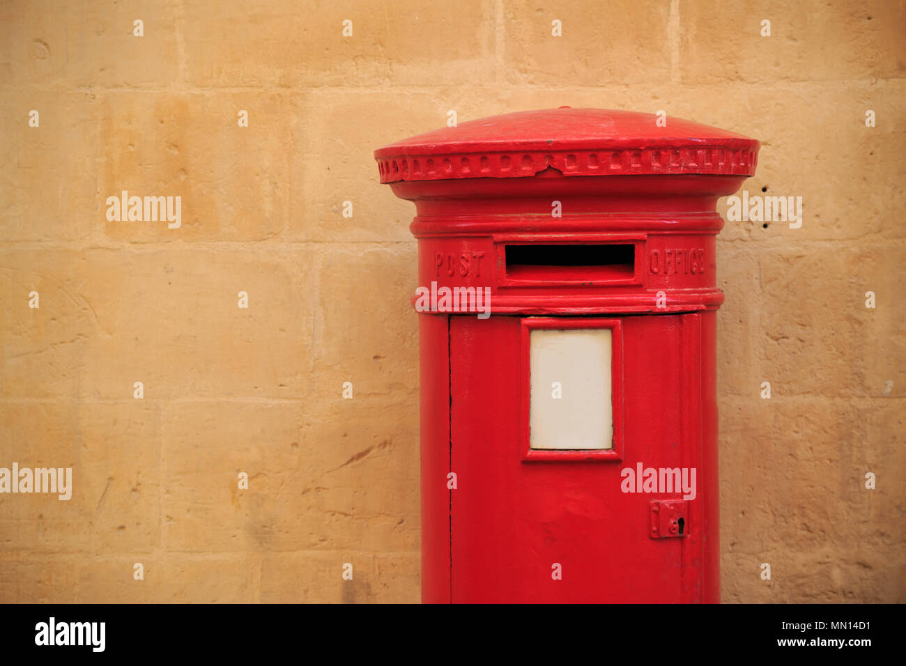 Traditional, aged, British letterbox in red color. Mailbox that ...