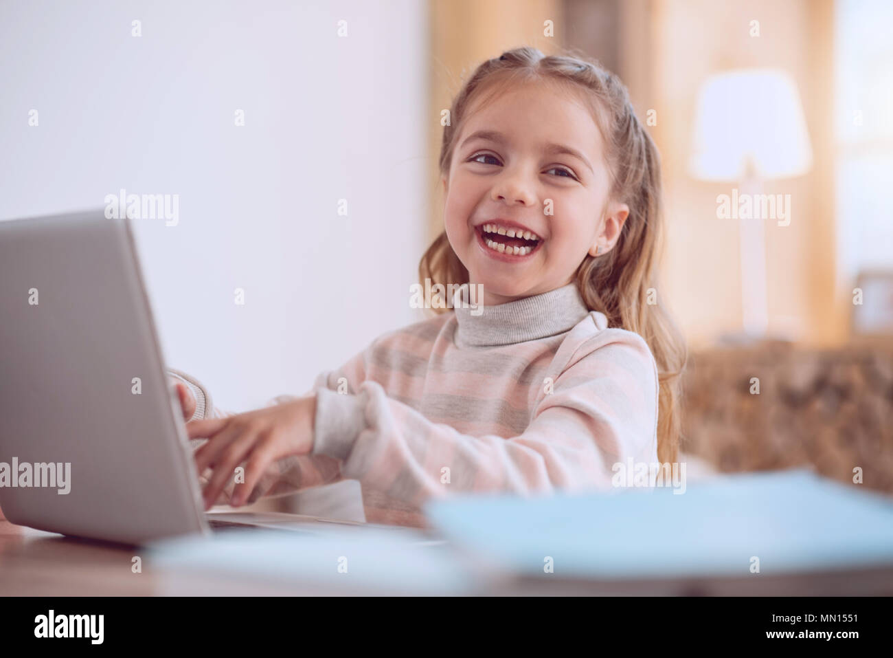 Nice positive girl having fun Stock Photo - Alamy