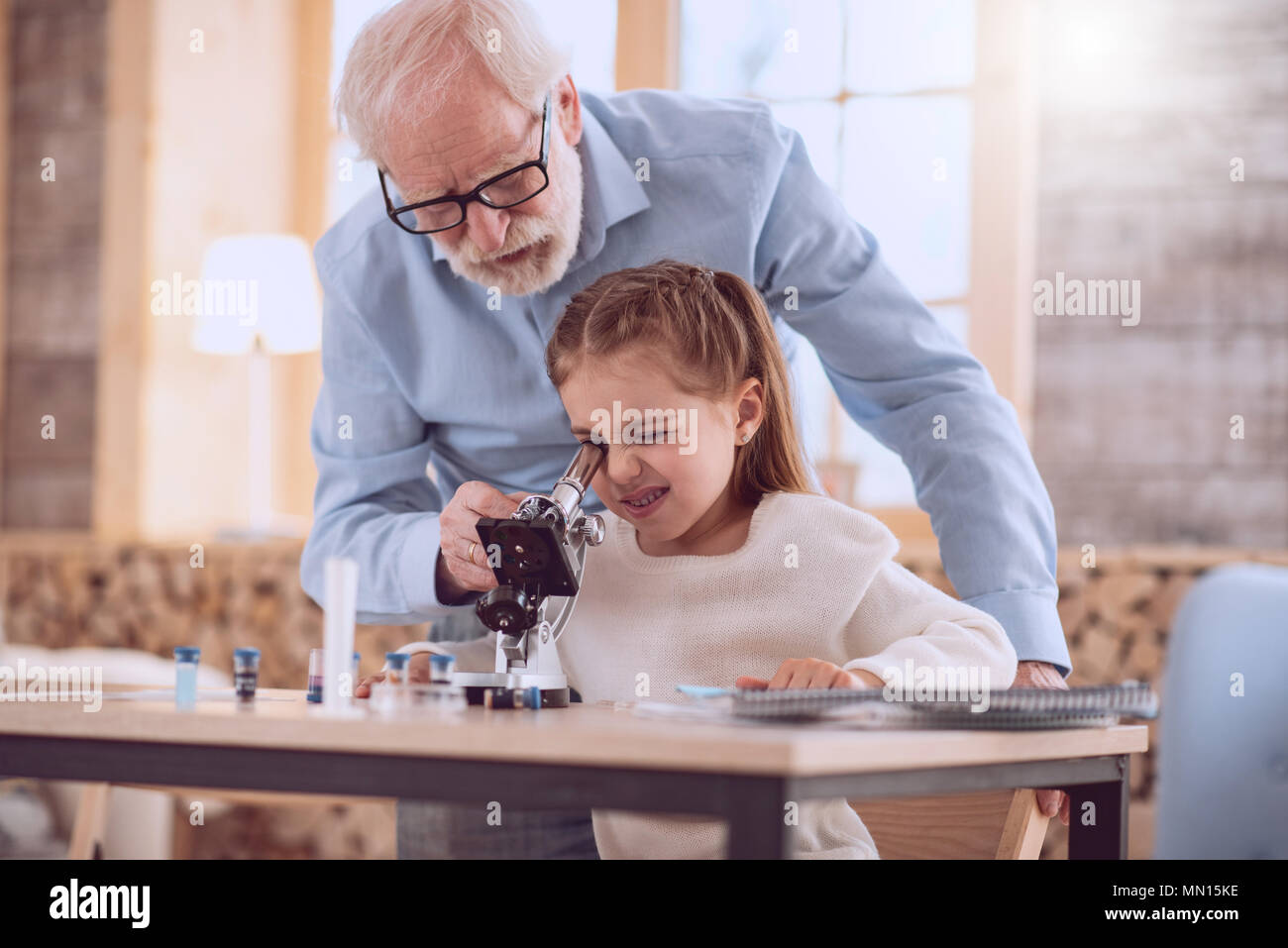 Closing one eye hi-res stock photography and images - Alamy