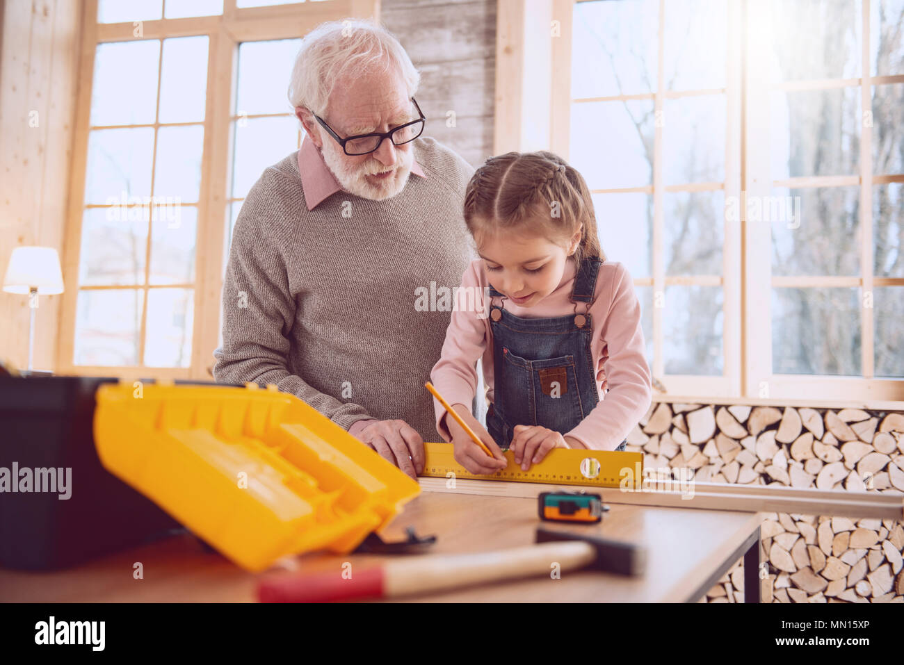 Cute young girl making marks Stock Photo - Alamy