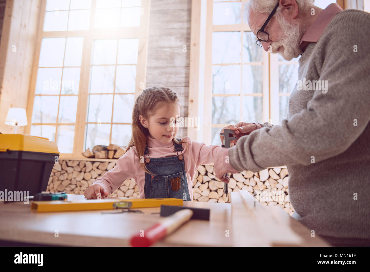 Smart pleasant girl trying to help Stock Photo - Alamy