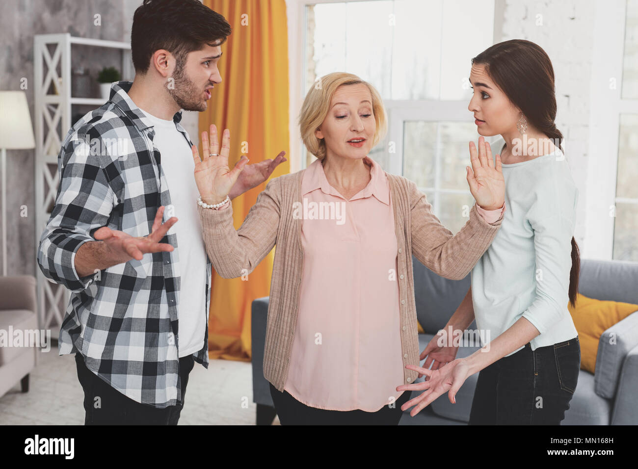 Angry young people having a fight Stock Photo - Alamy