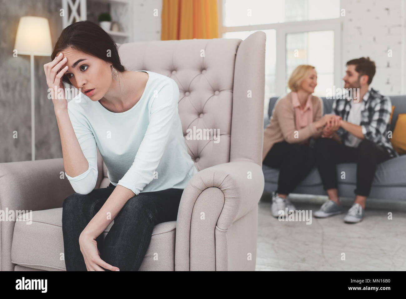Unhappy young woman touching her forehead Stock Photo - Alamy Unhappy young woman touching her forehead Stock Photo - Alamy