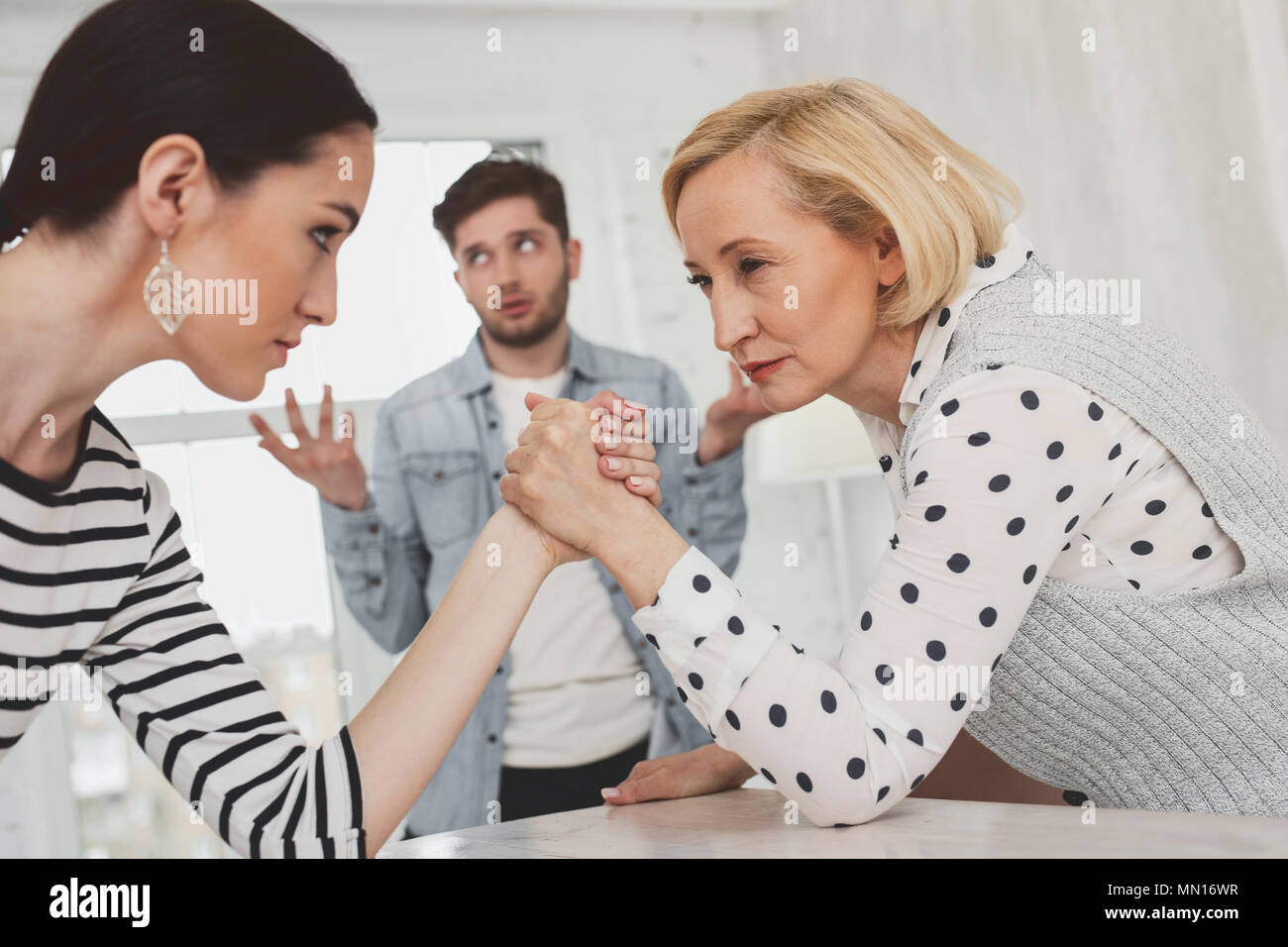 Serious nice women having a competition Stock Photo - Alamy