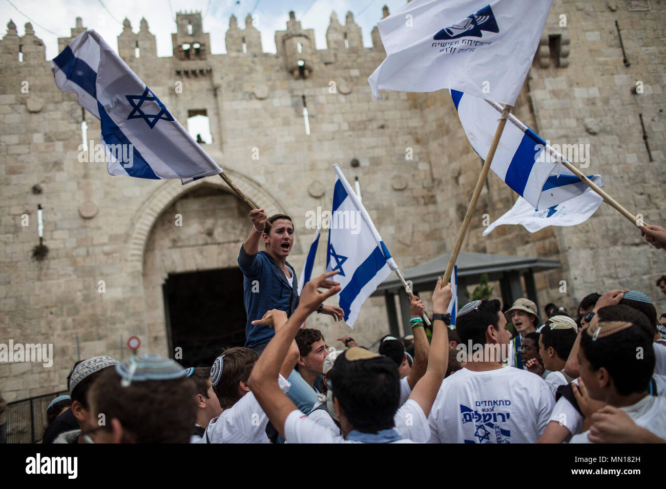 Jerusalem, Israel. 13th May, 2018. Jewish boys wave flags of Israel ...
