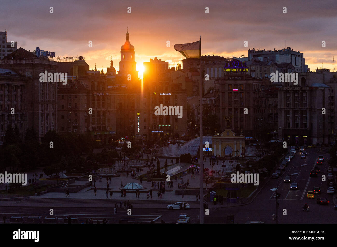 13 May 2018, Ukraine, Kiev: The sun sets behind the houses of the ...