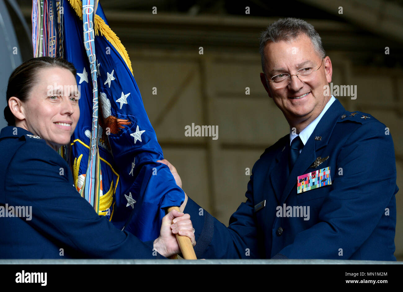 Col. Denise Donnell receives the 105th Airlift Wing guidon from Maj ...